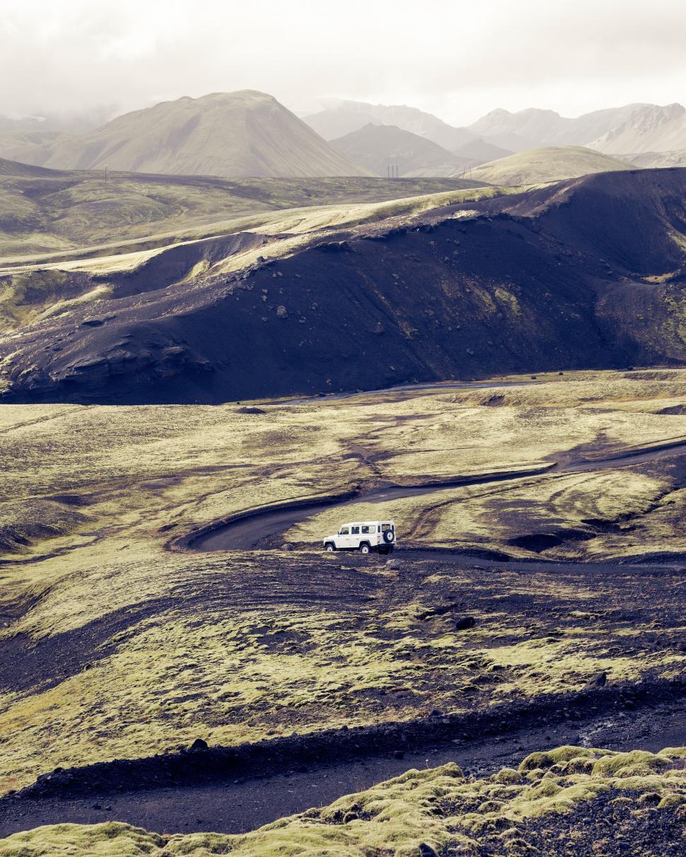 Free Stock Photo of Off-road vehicle navigating rugged volcanic ...