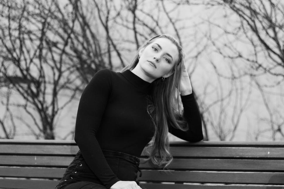 Free Stock Photo of Reflective woman in black turtleneck seated on ...
