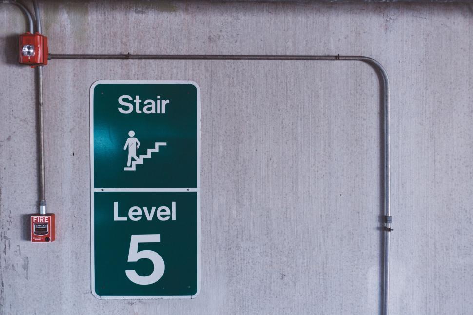 Free Stock Photo of Green stair level 5 sign on concrete wall with pipe ...