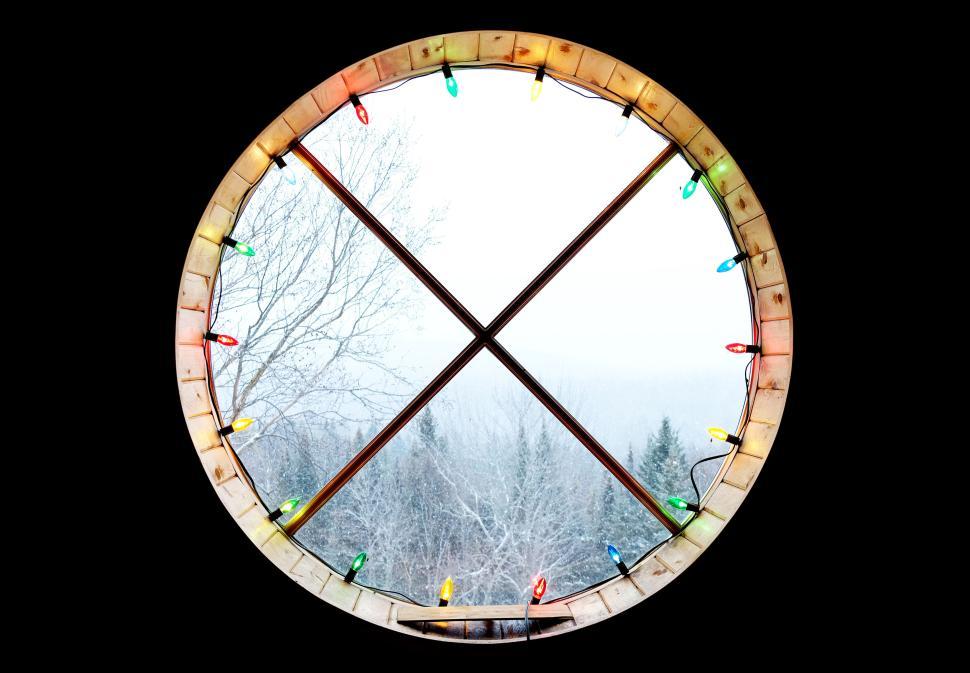 Free Stock Photo of Round window with colorful lights overlooking snowy ...