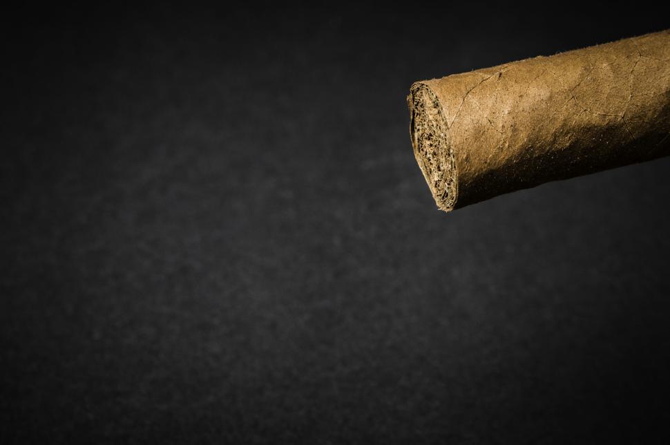 Free Stock Photo of Close-up of end of cigar on dark background with ...