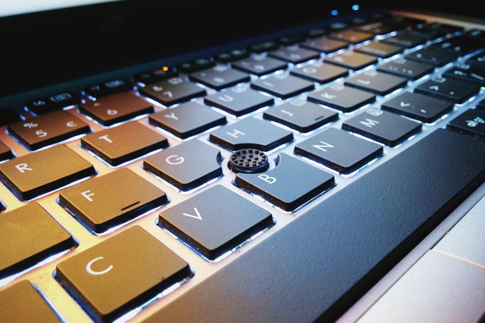 Free Stock Photo of Keyboard of a laptop computer glowing with ...