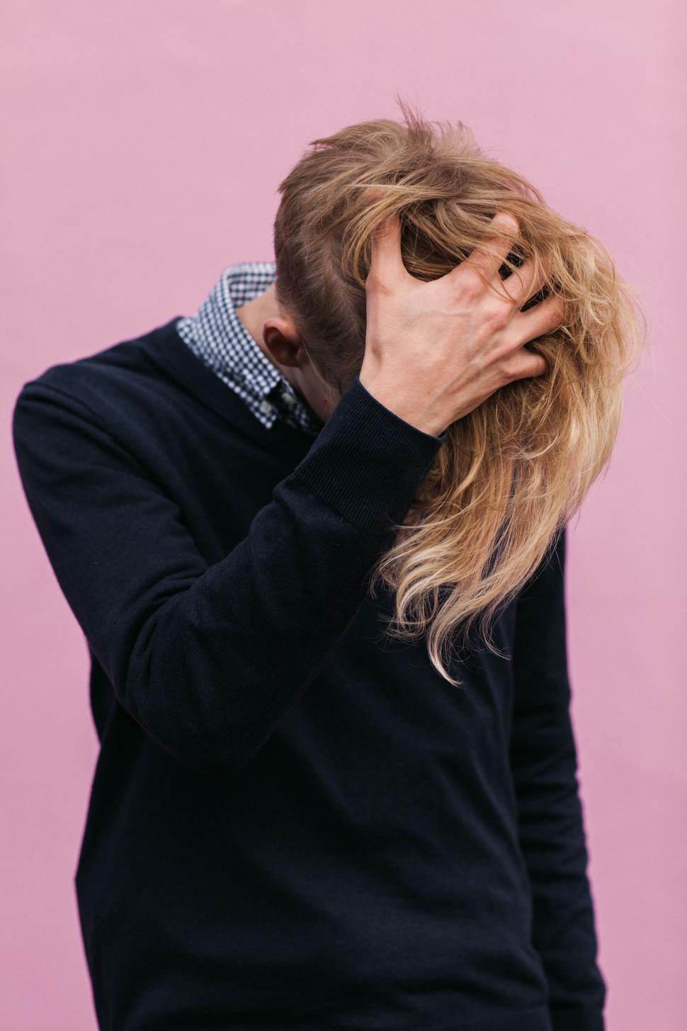 Free Stock Photo of Person grasping long blonde hair in front of pink ...