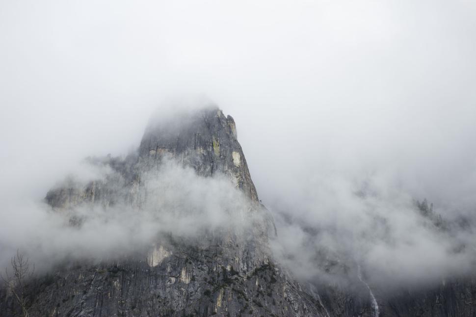 Free Stock Photo of Foggy mountain peak covered in mist with rocky ...