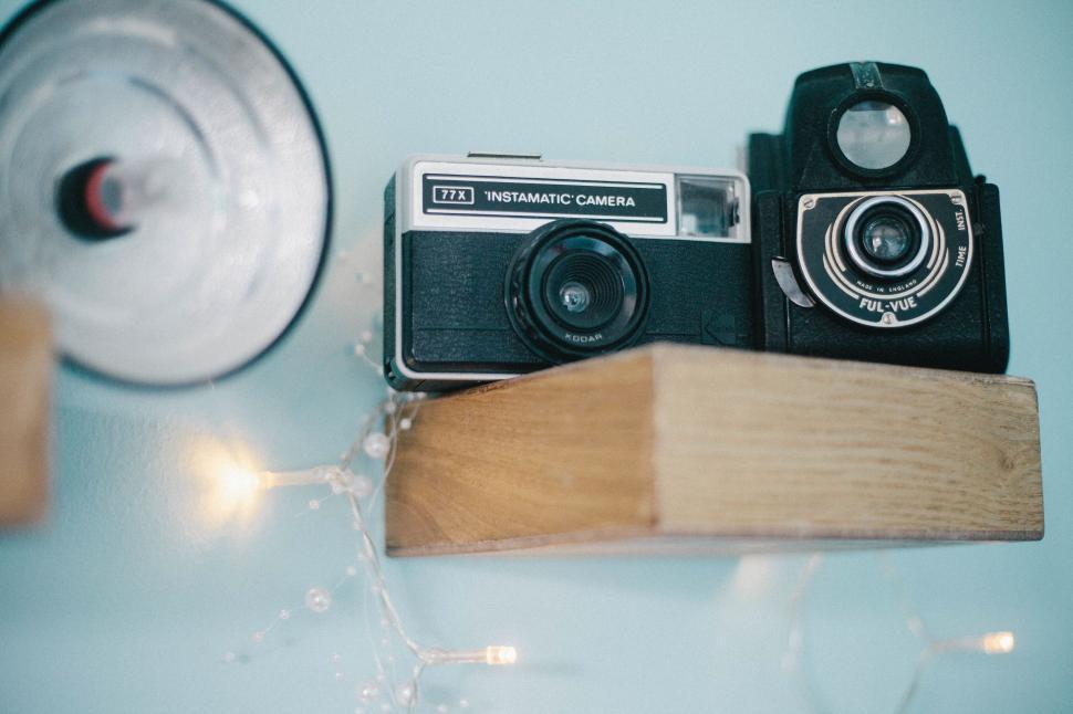 Free Stock Photo of Vintage cameras and light fixture on minimalist ...