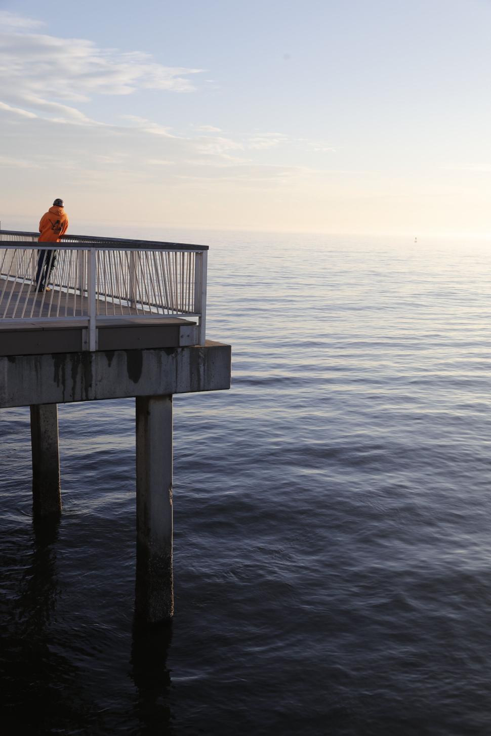 Free Stock Photo of Peaceful pier overlooking the calm ocean under a ...