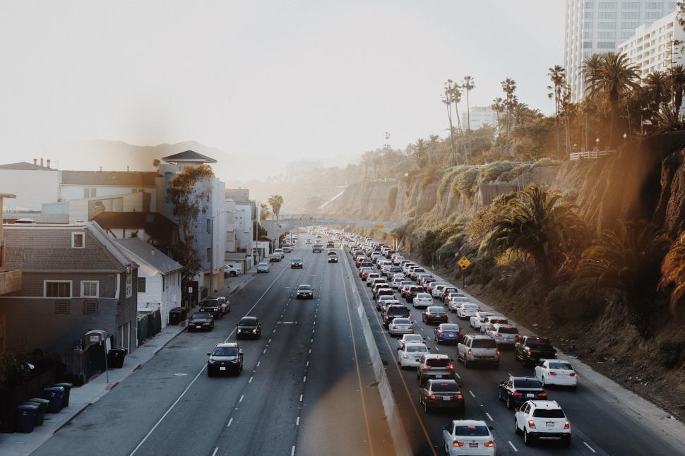 Free Stock Photo of Busy urban highway near the coastline filled with ...
