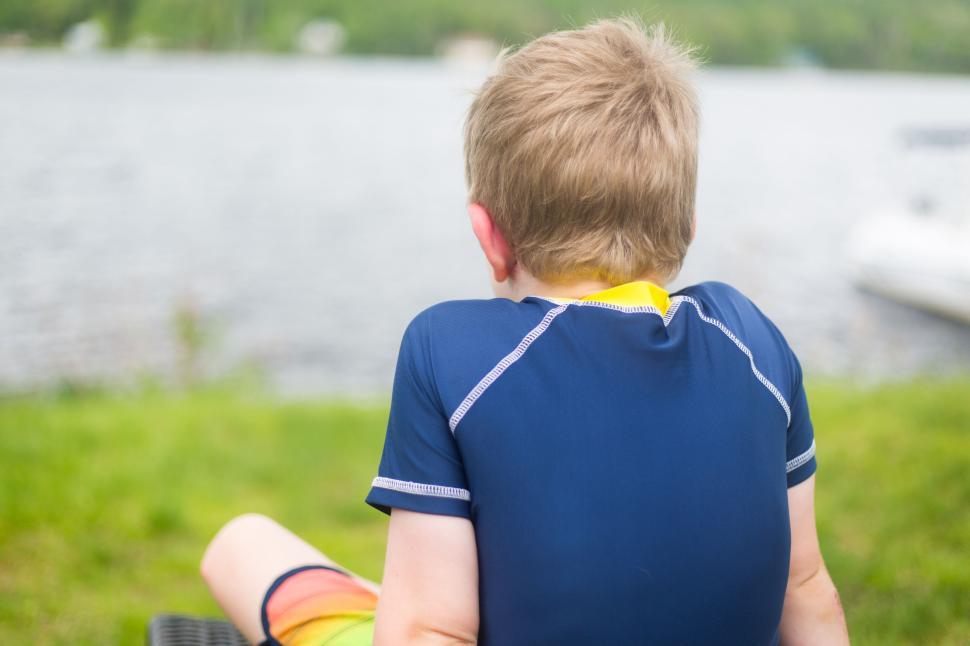 Free Stock Photo of Blond child in swimwear facing a tranquil lake ...