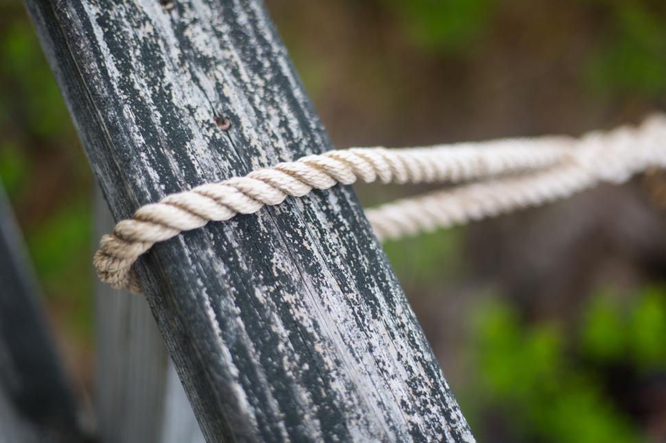 Free Stock Photo of Close-up of rope tied around weathered wooden post ...