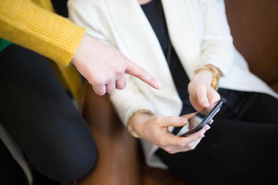 Free Stock Photo of Close-up of person using smartphone while sitting ...