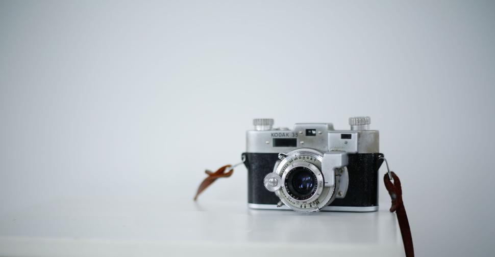 Free Stock Photo of Vintage Kodak 35mm camera on white tabletop surface ...