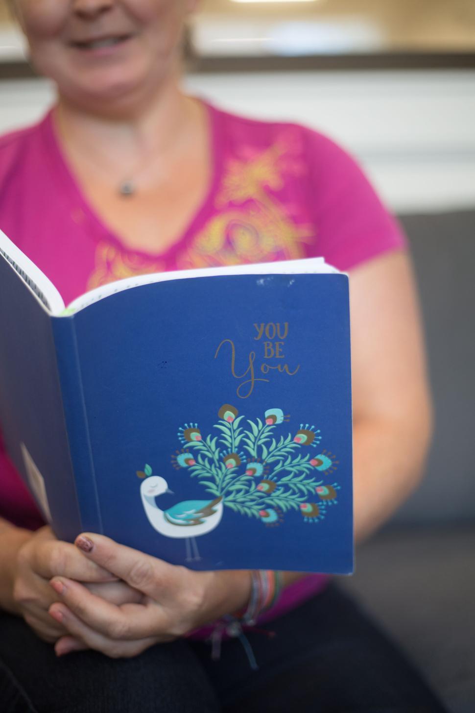 Free Stock Photo of Person reading a book titled You Be You while ...