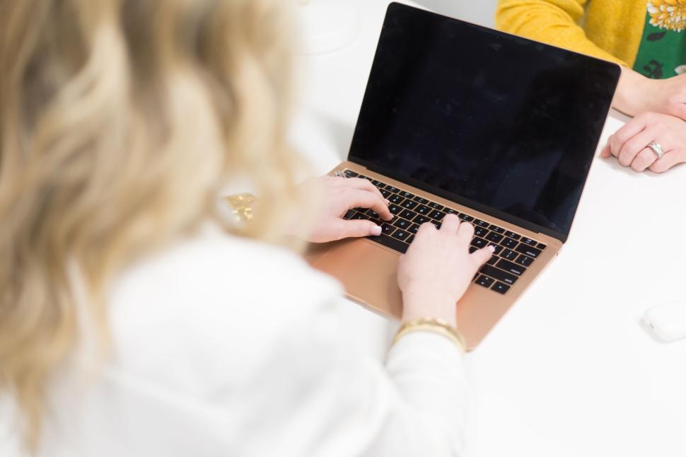 Free Stock Photo of Hands actively typing on a laptop on a white desk ...