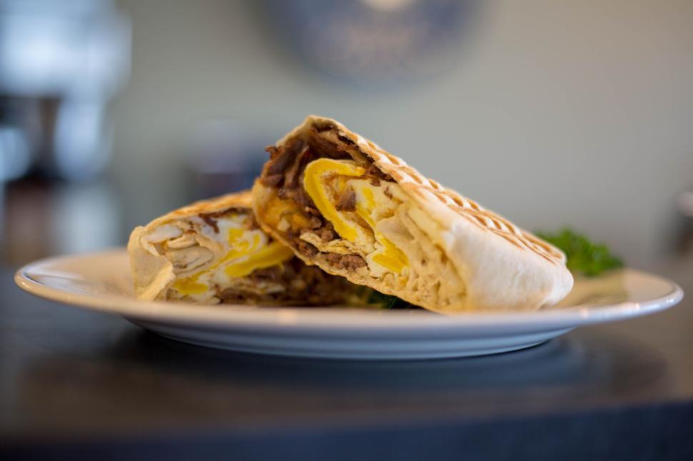 Free Stock Photo of Plate with a cut open wrap filled with eggs ...