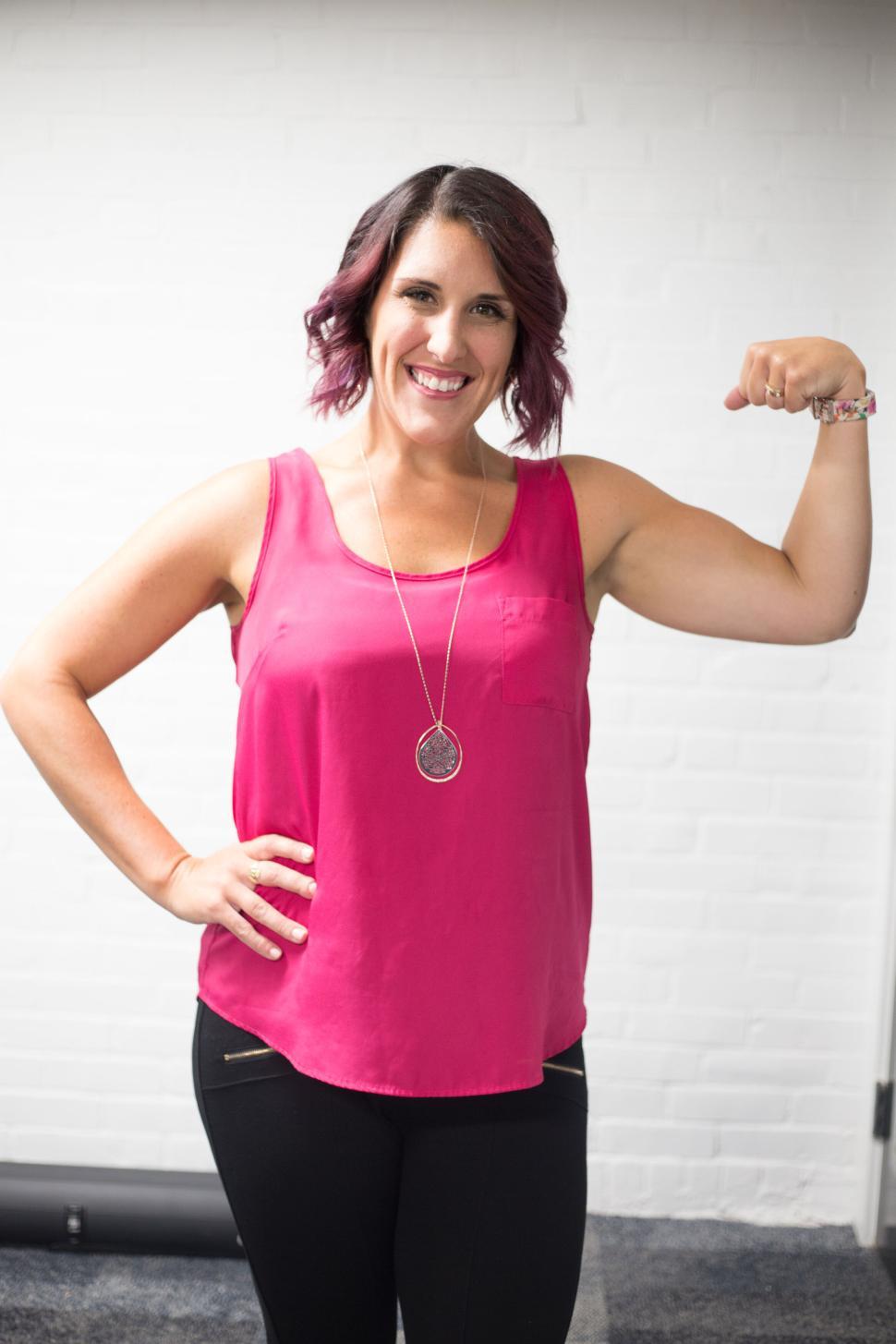 Free Stock Photo of Woman flexing her arm with confidence and a big ...
