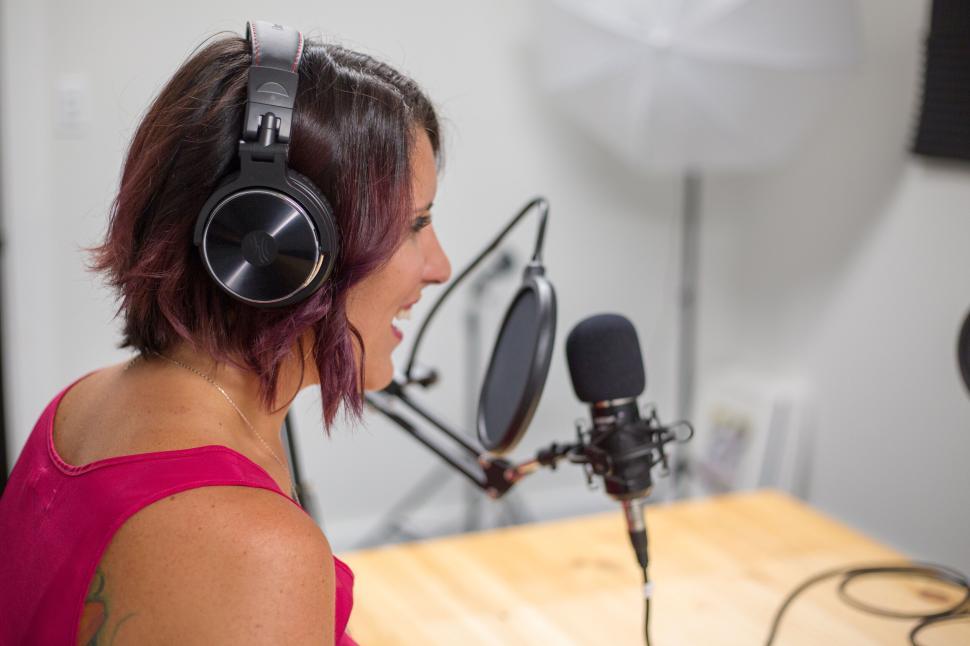 Free Stock Photo of Woman recording a podcast in a studio with ...