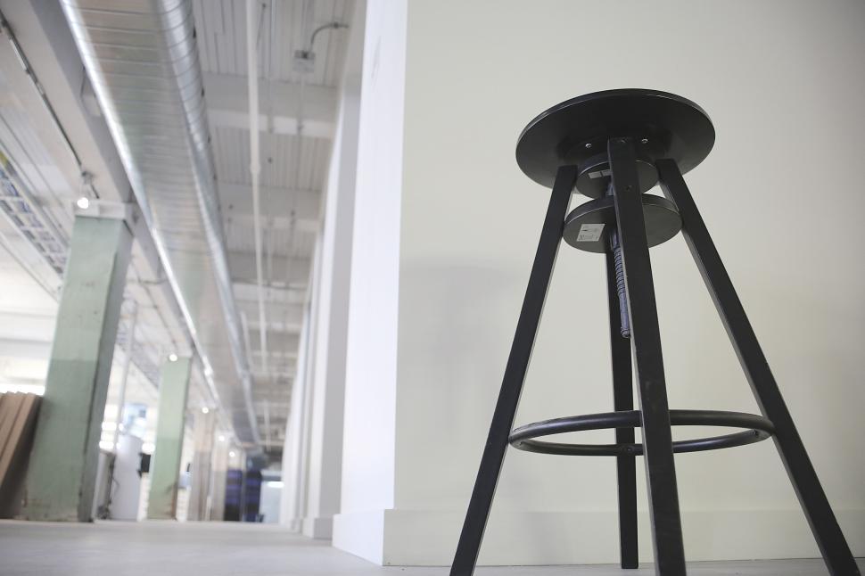 Free Stock Photo of Black metal high stool placed in a minimalist ...