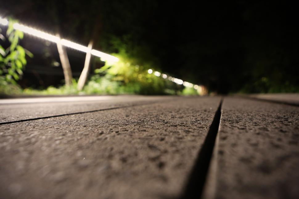 Free Stock Photo of Nighttime boardwalk with illuminated pathway and ...