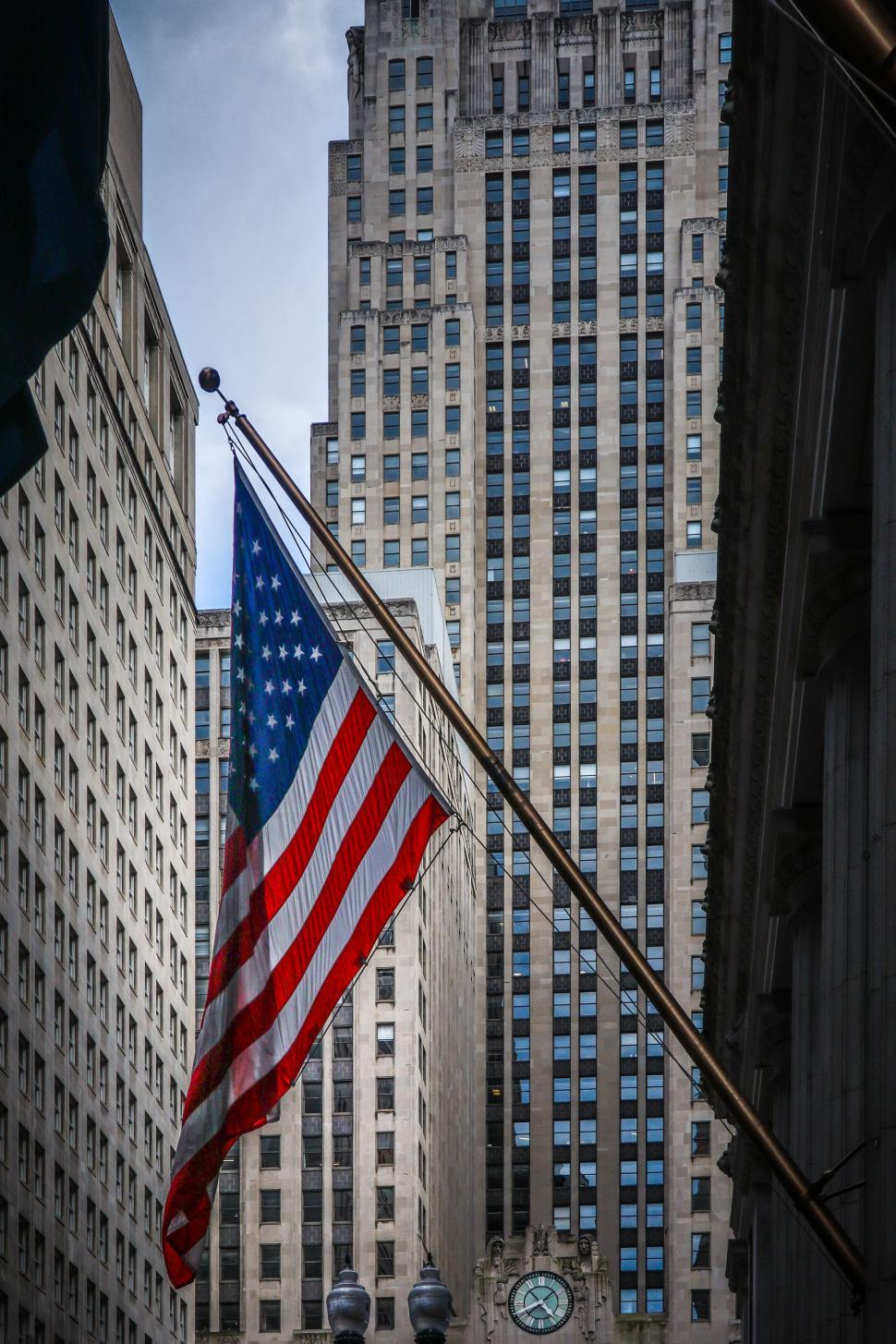 Free Stock Photo of American flag waving with the Chicago Board of ...