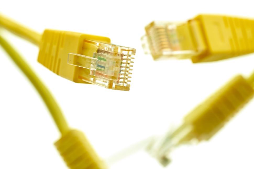 Free Stock Photo of Yellow ethernet cables with clear connectors on a ...