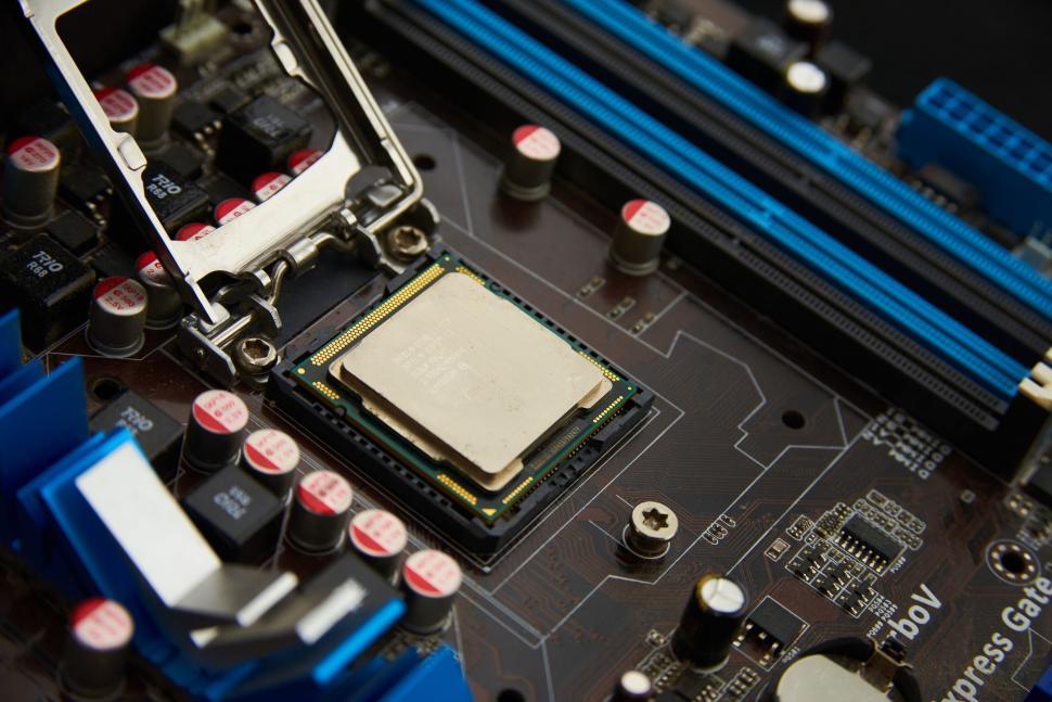 Free Stock Photo of CPU placed in motherboard socket showing computer ...