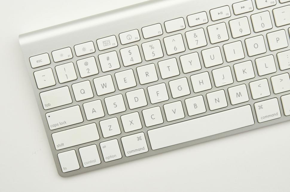 Free Stock Photo of Sleek and modern wireless keyboard in white with ...