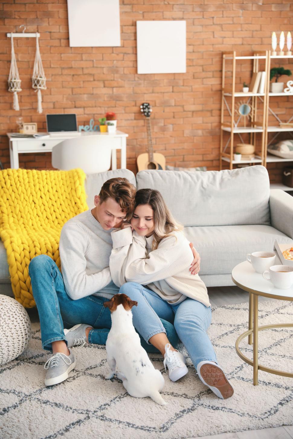 Free Stock Photo of Couple and dog bond in a cozy living room, tender ...