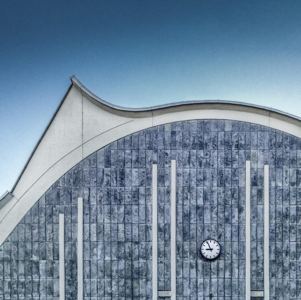 Free Stock Photo of Modern building with wavy roof and clock against ...
