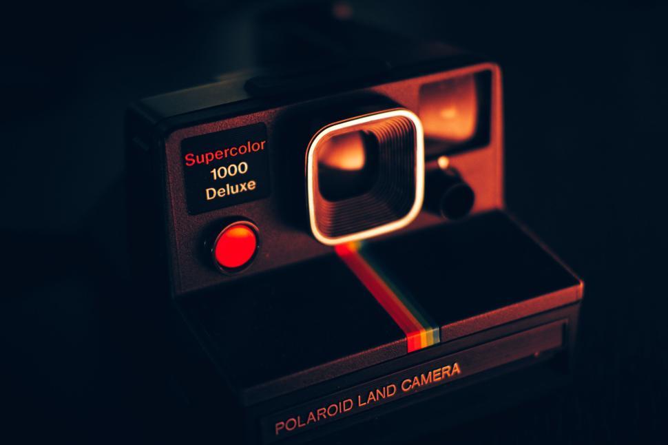 Free Stock Photo of Vintage Polaroid camera with a rainbow stripe on ...