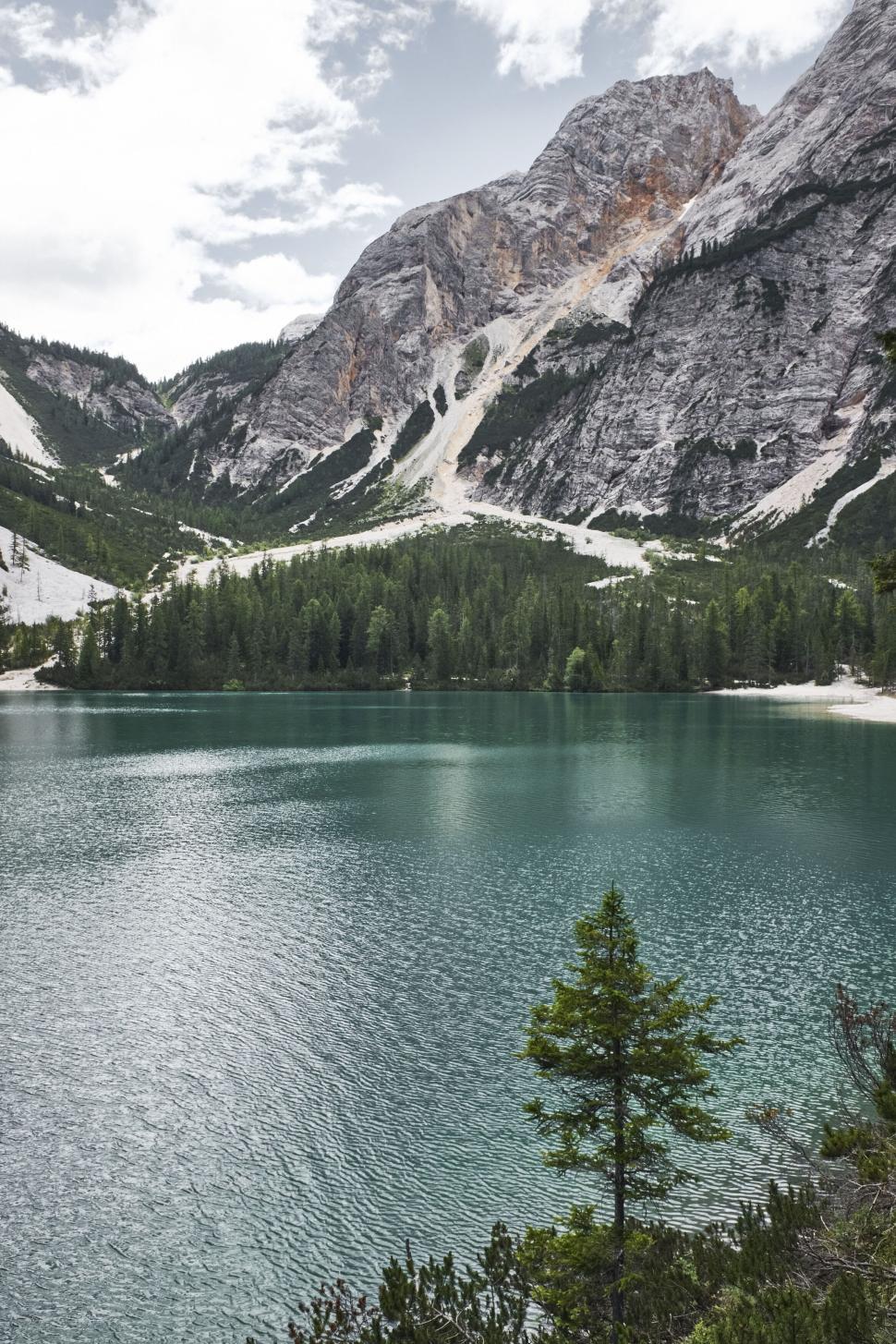 Free Stock Photo of Breathtaking alpine lake surrounded by towering ...
