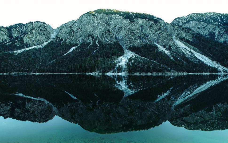 Free Stock Photo of Symmetrical reflection of mountain ridge on calm ...