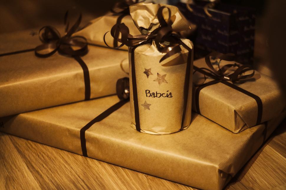 Free Stock Photo of Wrapped gifts with ribbons on a wooden floor ...
