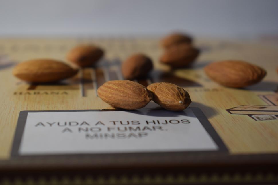 Free Stock Photo of Close-up of almonds placed on a board with a ...
