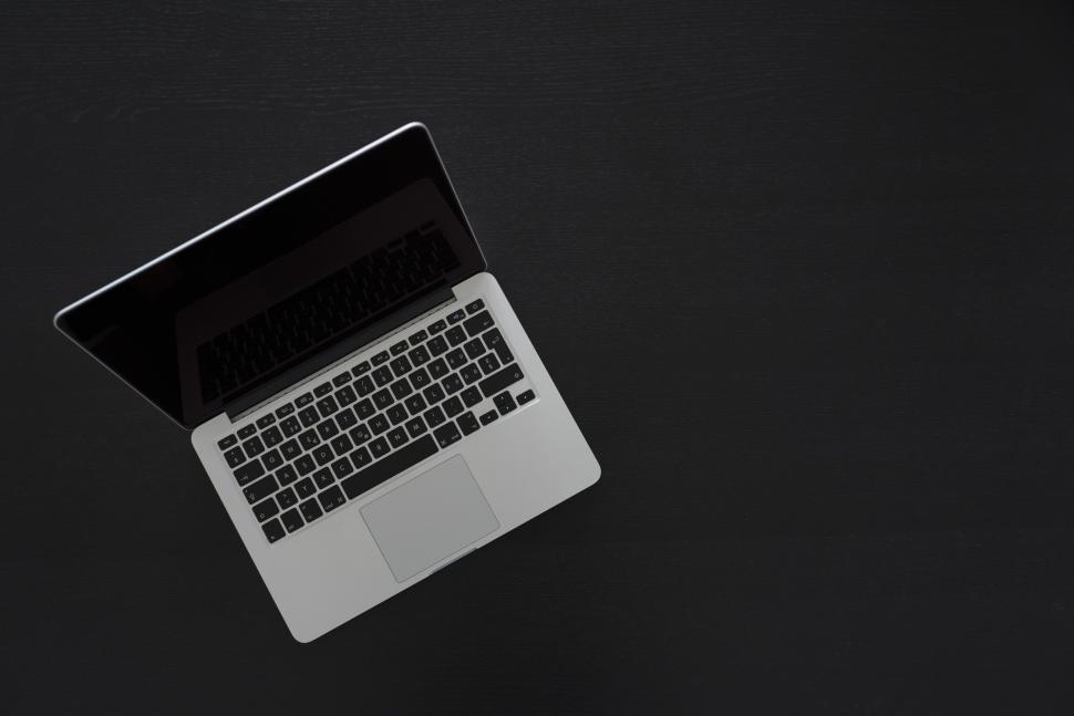 Free Stock Photo of Open laptop on black surface with a minimalistic ...
