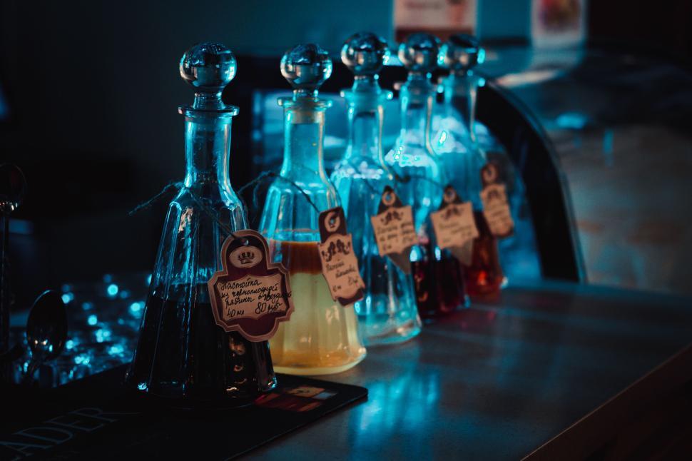 Free Stock Photo of Various elegant glass bottles with labels lined up ...
