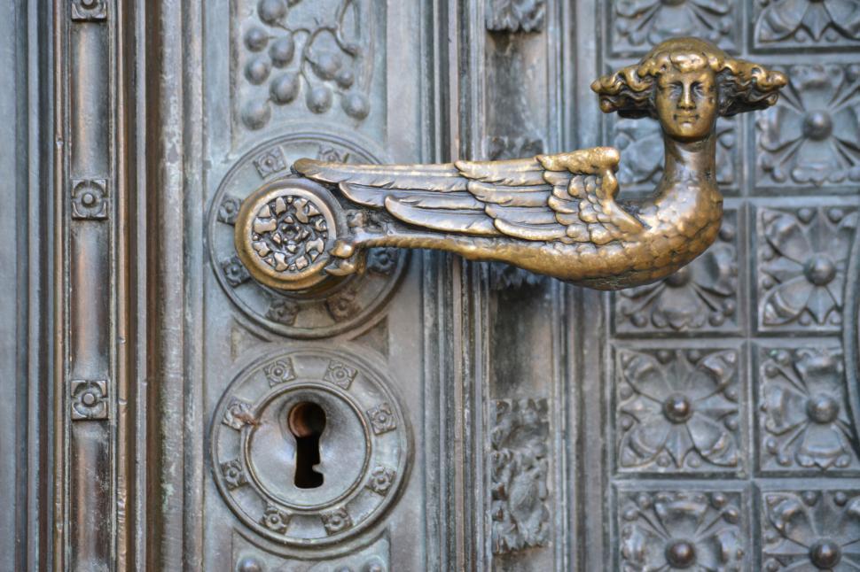 Free Stock Photo of Bronze door handle with face and wings on ...