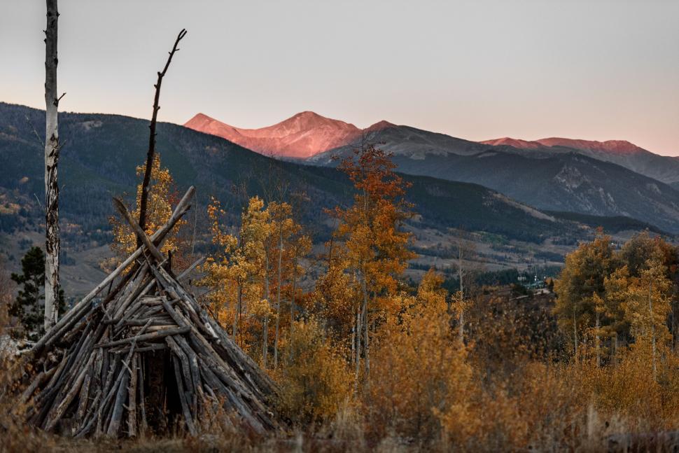 Free Stock Photo of Rustic Wooden Teepee in Mountain Landscape at Dusk ...