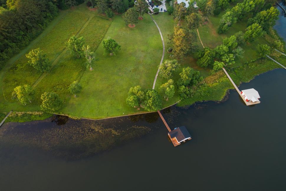 Free Stock Photo of Aerial view of a lakeside dock amidst green ...