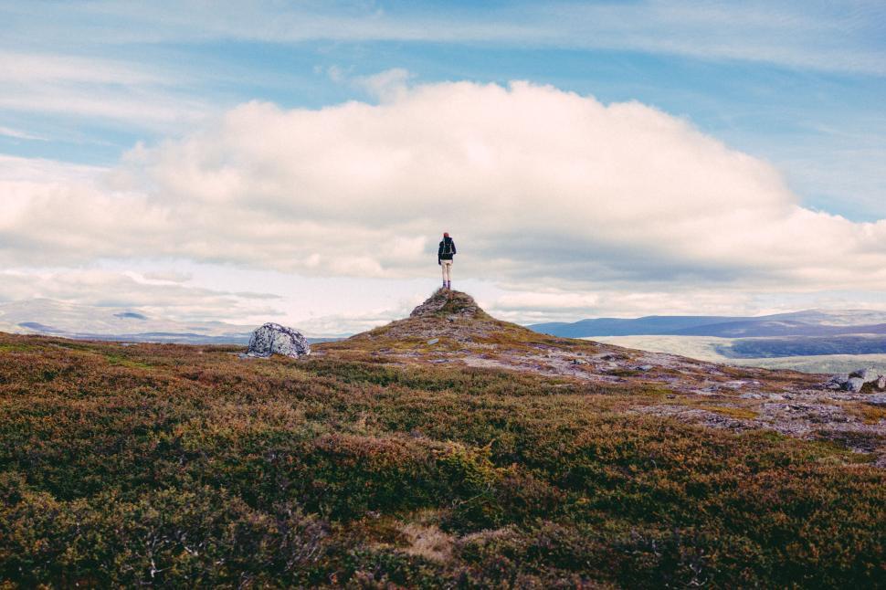 Free Stock Photo of Person standing alone on a hill overlooking vast ...