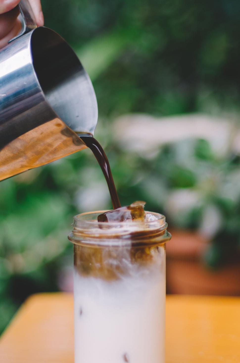 Free Stock Photo of Pouring cold brew coffee into glass with iced milk. | Download Free Images ...