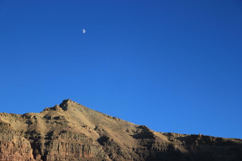 Free Stock Photo of Moon rising over dry hill and clear blue sky ...