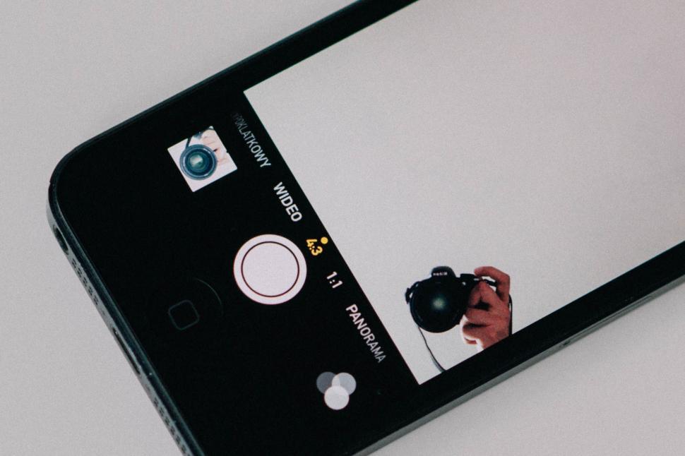 Free Stock Photo of Smartphone capturing an image of a camera lens ...