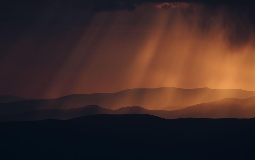 Free Stock Photo of Sun rays shine through clouds over mountain ...