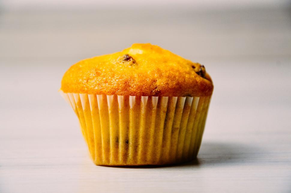 Free Stock Photo of Close-up image of a golden muffin on a light ...