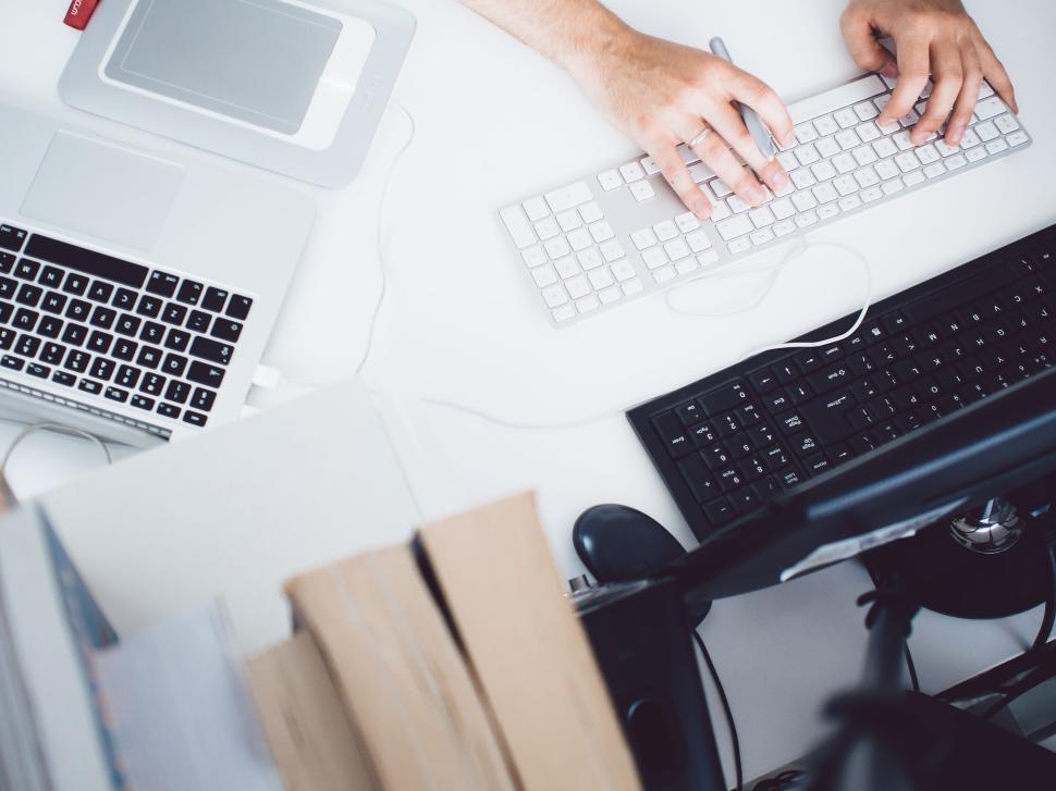 Free Stock Photo of Hands typing on multiple keyboards in an office ...