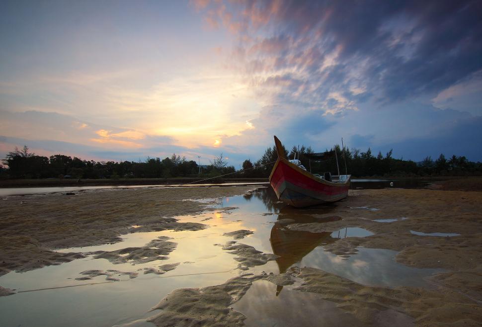 Free Stock Photo of Tranquil boat on reflective beach during sunset ...