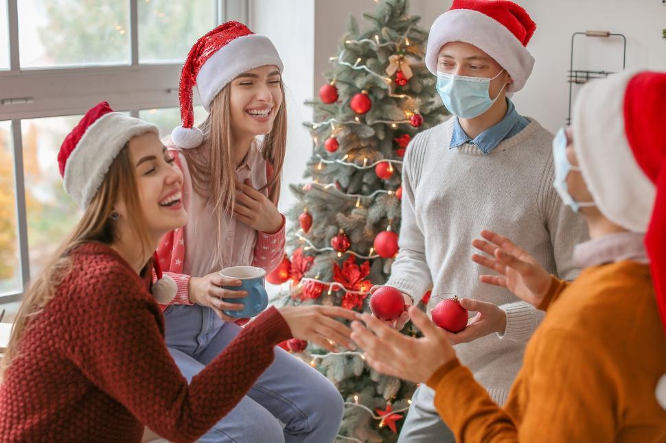 Free Stock Photo of Friends celebrating Christmas with hot cocoa and ...