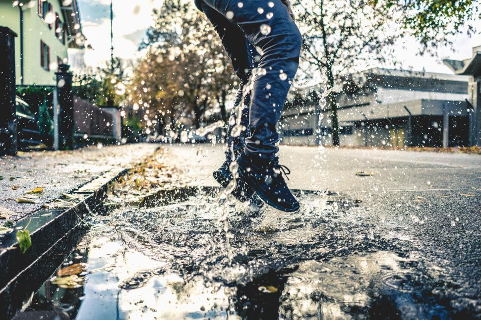 Free Stock Photo of Person jumping into a puddle splashing water ...