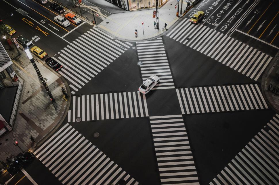 Free Stock Photo of Aerial view of a city crosswalk with a single ...