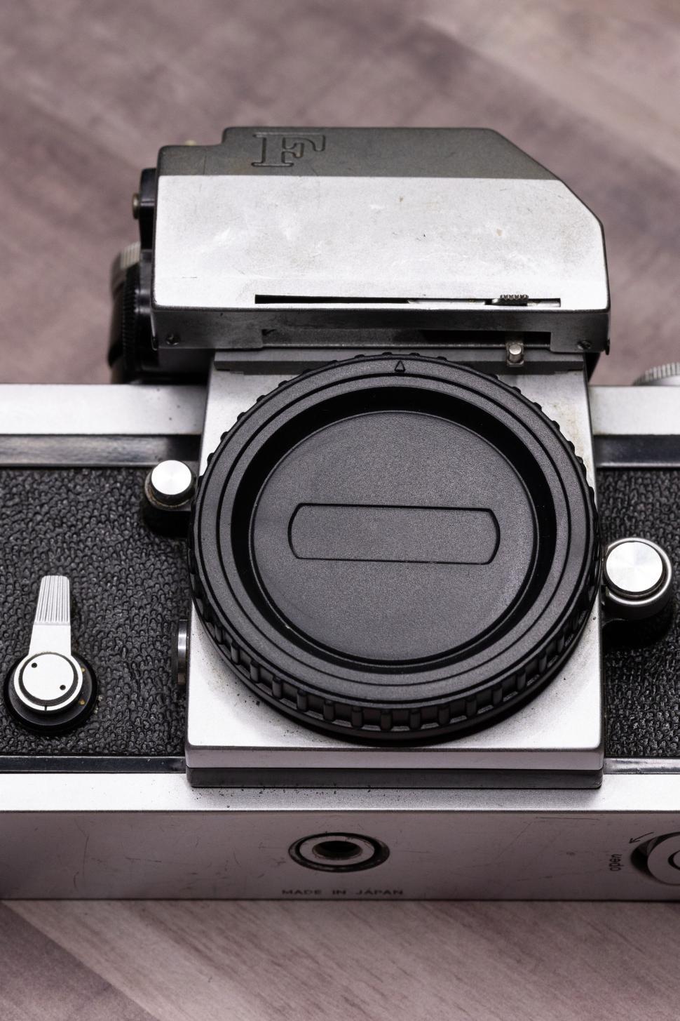 Free Stock Photo of Top view of a retro analog camera with lens cap ...
